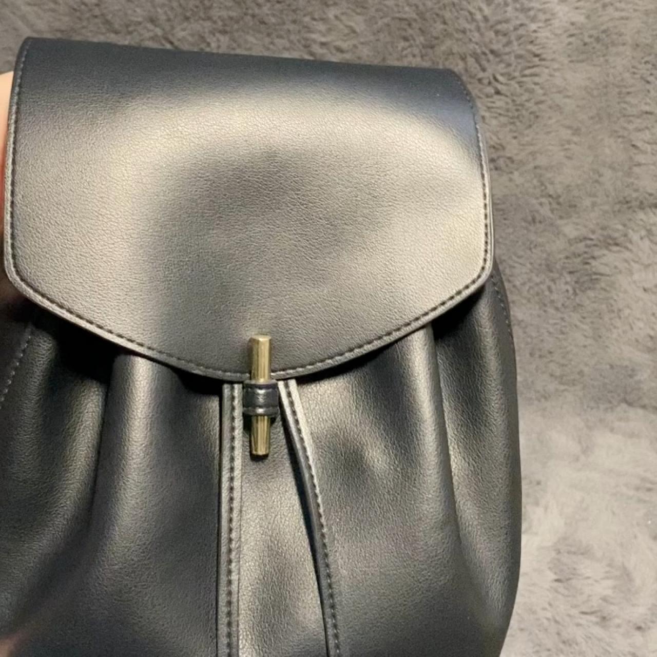 Topshop Mini black faux leather backpack 🕷 ️tears... - Depop