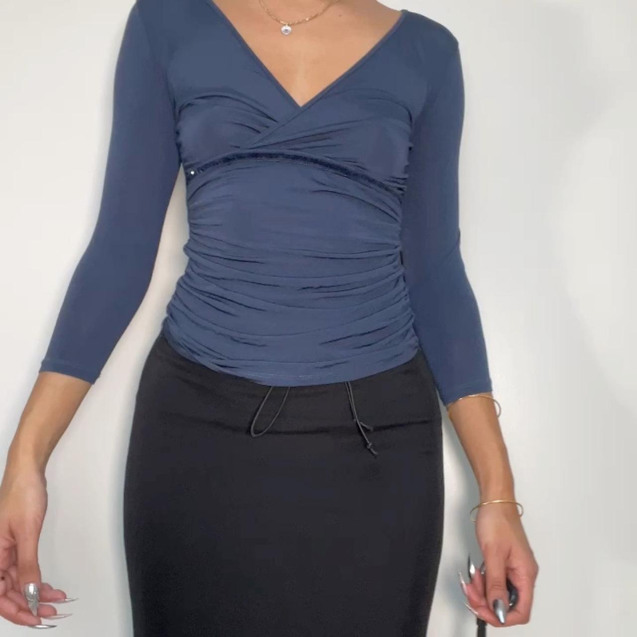 Y2k navy v neck, 3/4 sleeve top. The top has a... - Depop