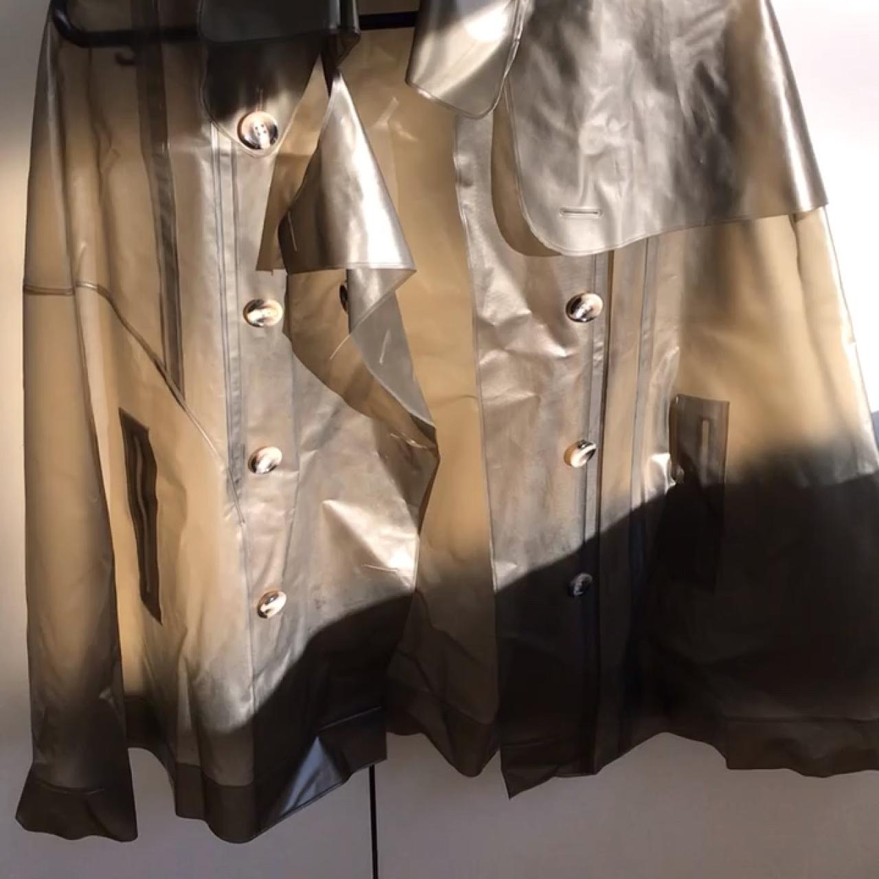 Terra translucent raincoat cape with buttons and... - Depop