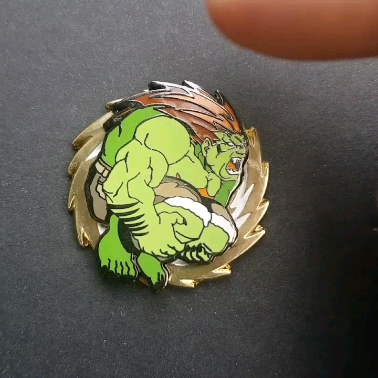 Blanks spinning enamel pin - Depop