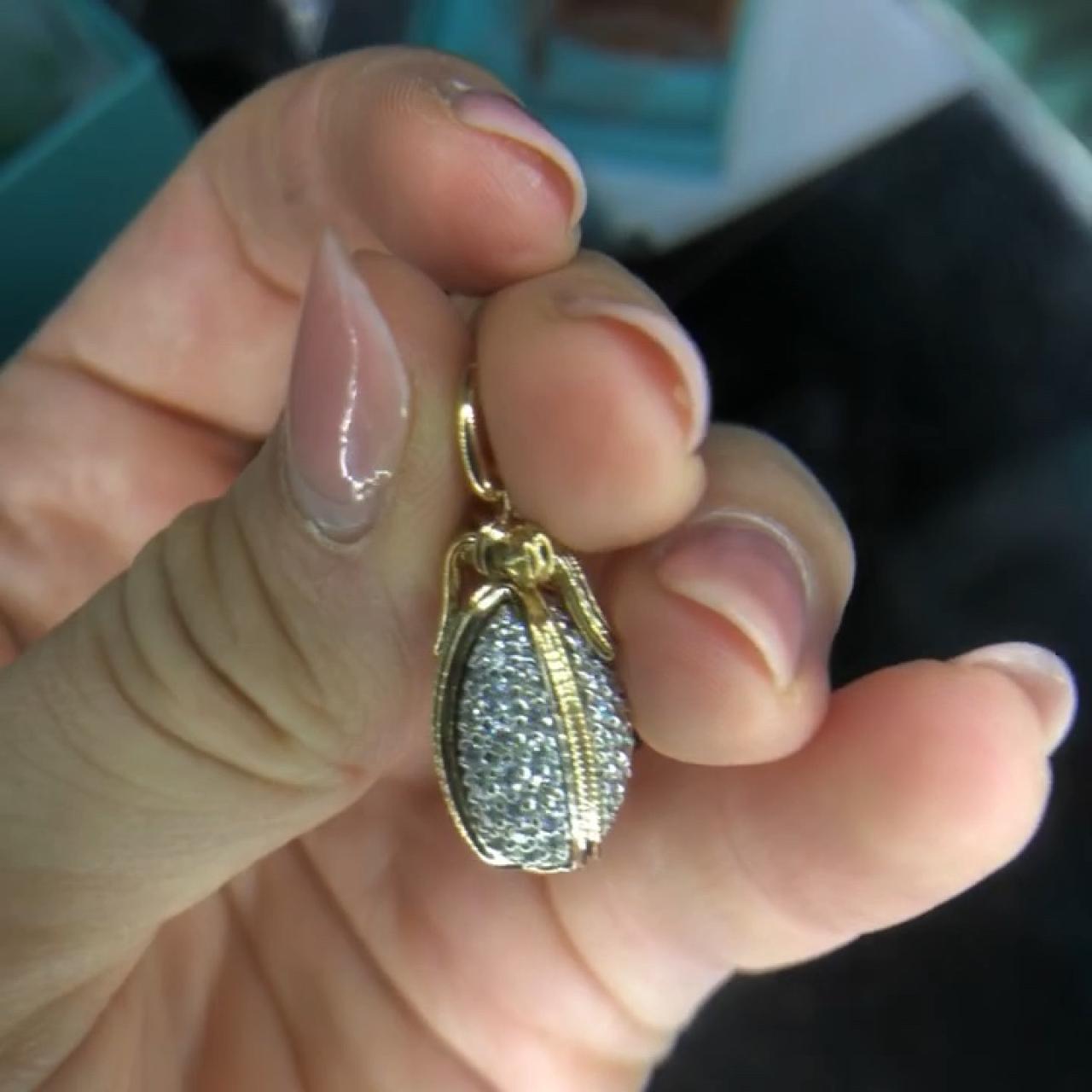 This Tiffany & Co. egg charm was created by French... - Depop